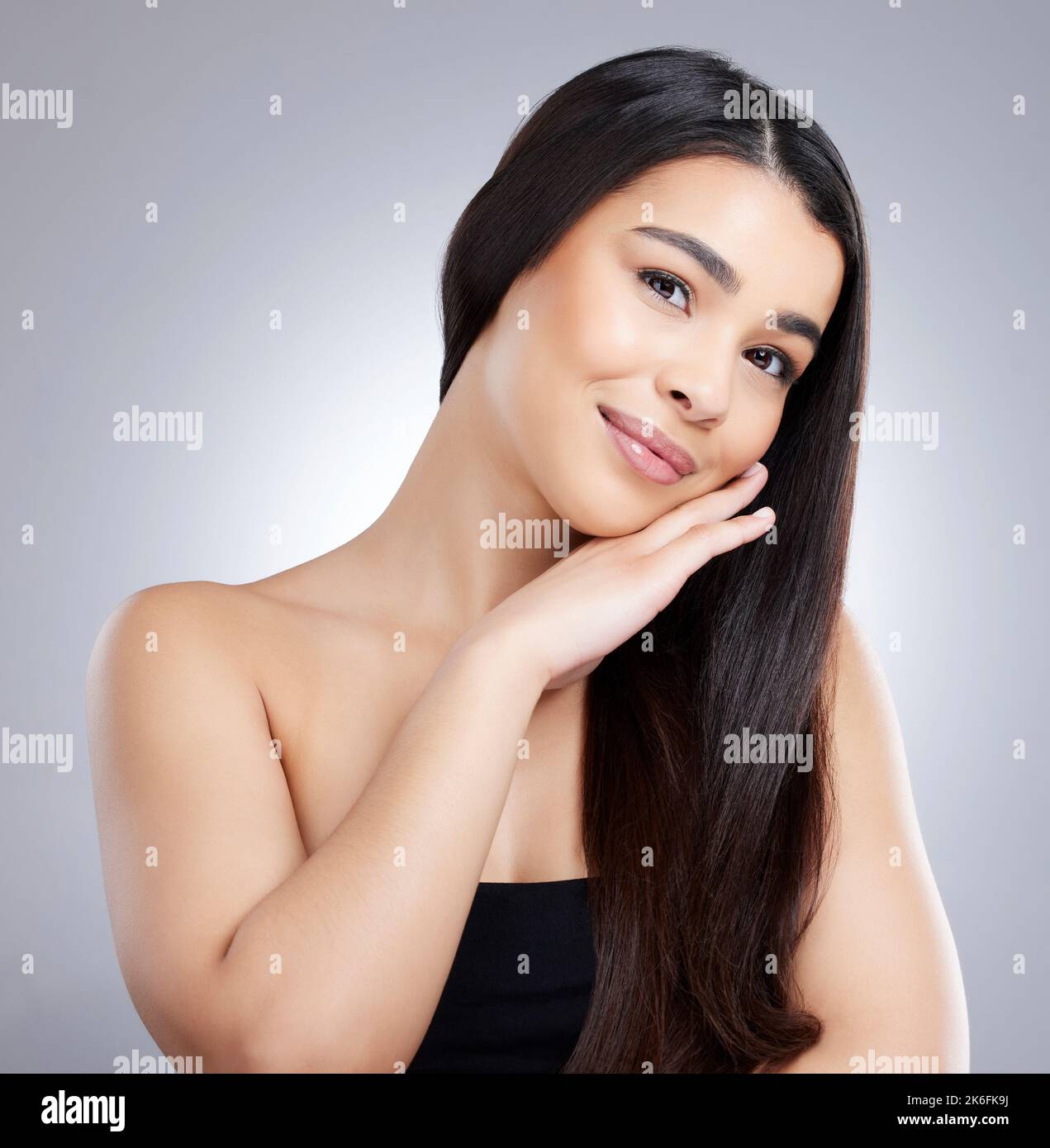 Long hair represents strength, resilience and patience. Studio portrait ...