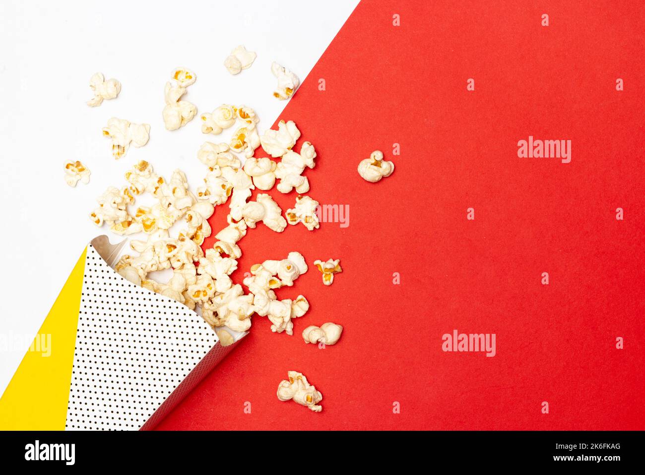 Snack of watching movie concept, Sweet popcorn float out from paper cup ...