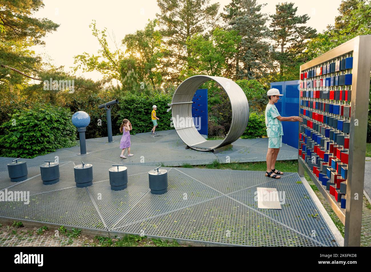 Kids play with telescopes and other stuff at observatory park in ...