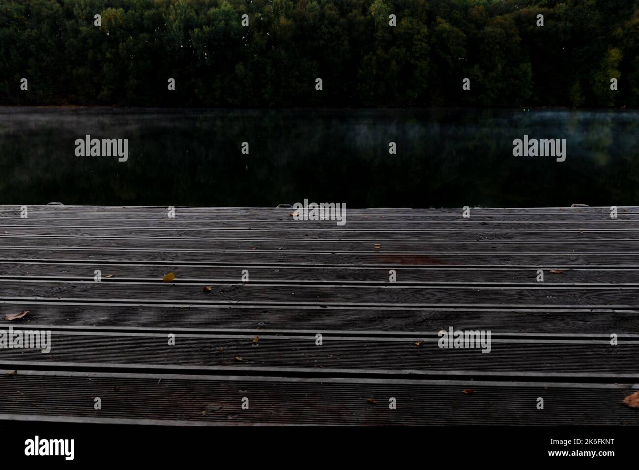 Disturbing atmosphere on a pontoon, a foggy night. Cold scene Stock ...