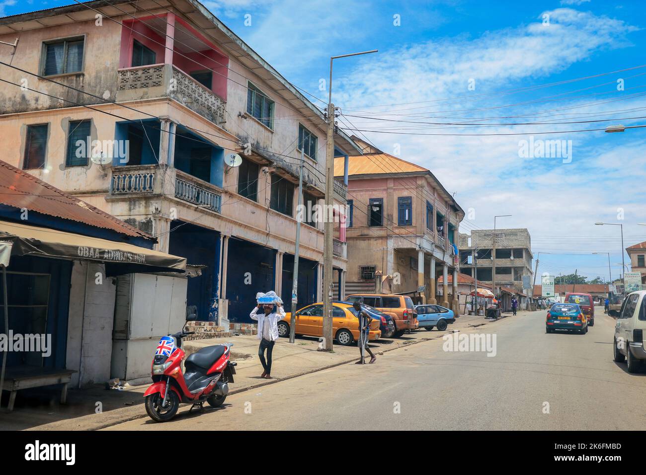 Kumasi, Ghana - April 06, 2022: Local Ghana People crossing the Crowded ...