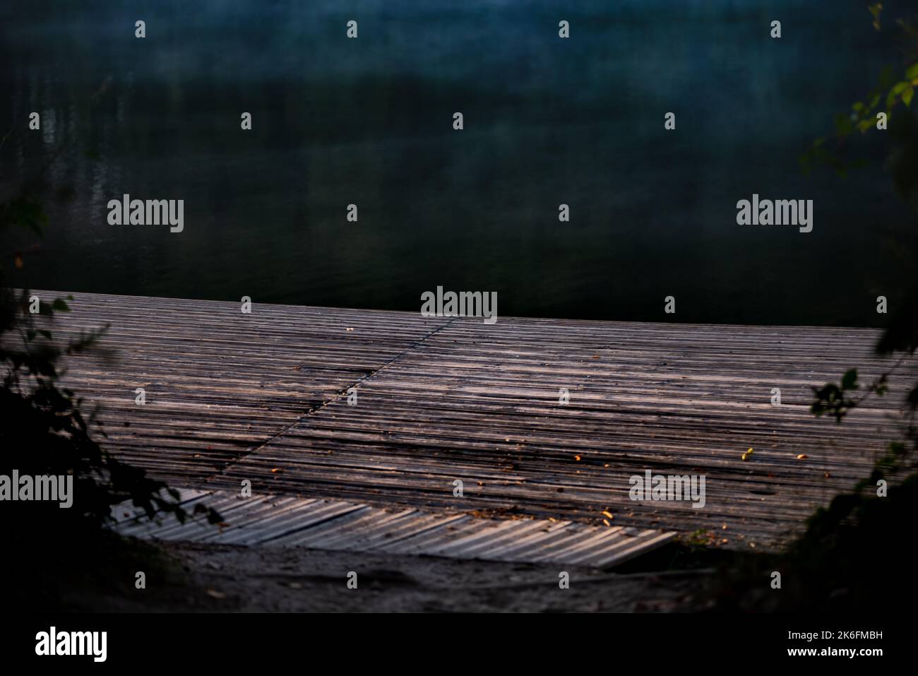 Disturbing atmosphere on a pontoon, a foggy night. Cold scene Stock ...