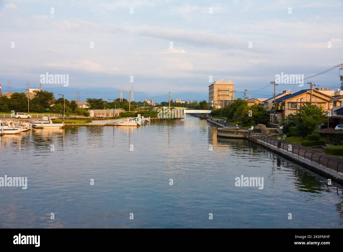 Scenery of Iwase canal and Toyama townscape at sunset Stock Photo - Alamy