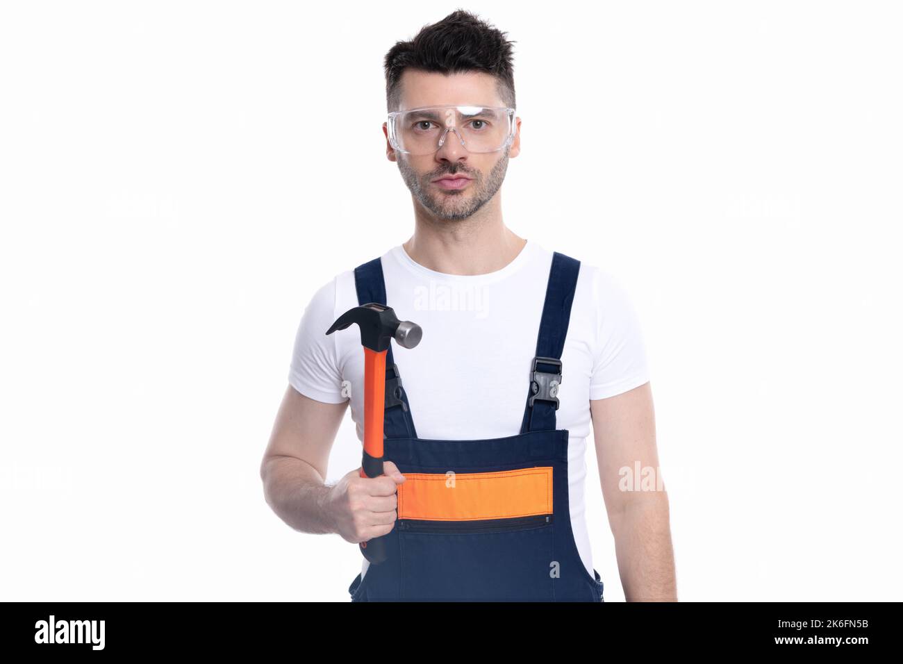 handyman with hammer in studio. positive handyman hold hammer isolated ...