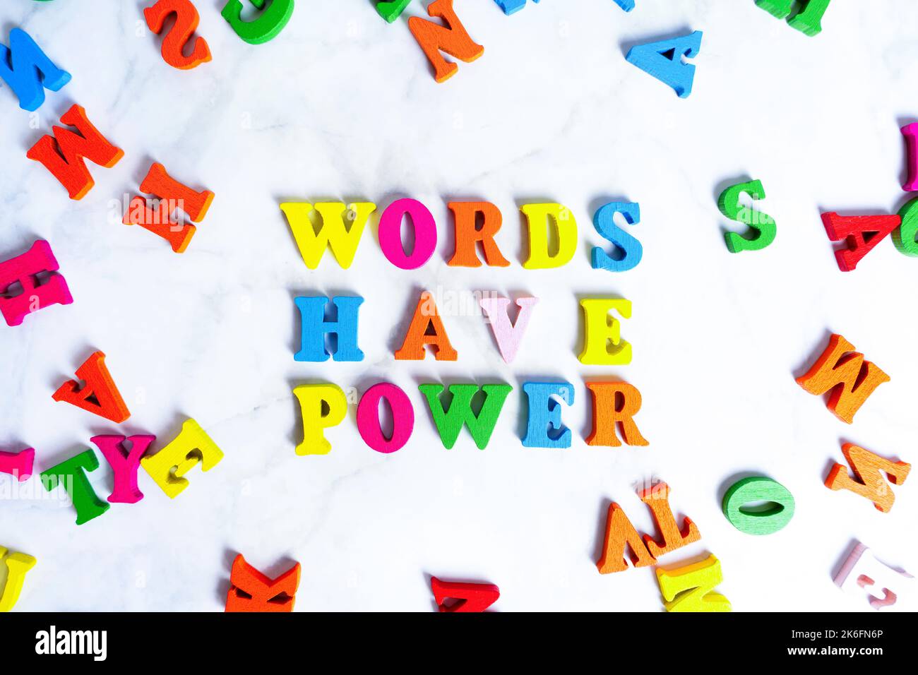 WORDS HAVE POWER lettering made from multicolored wooden characters ...