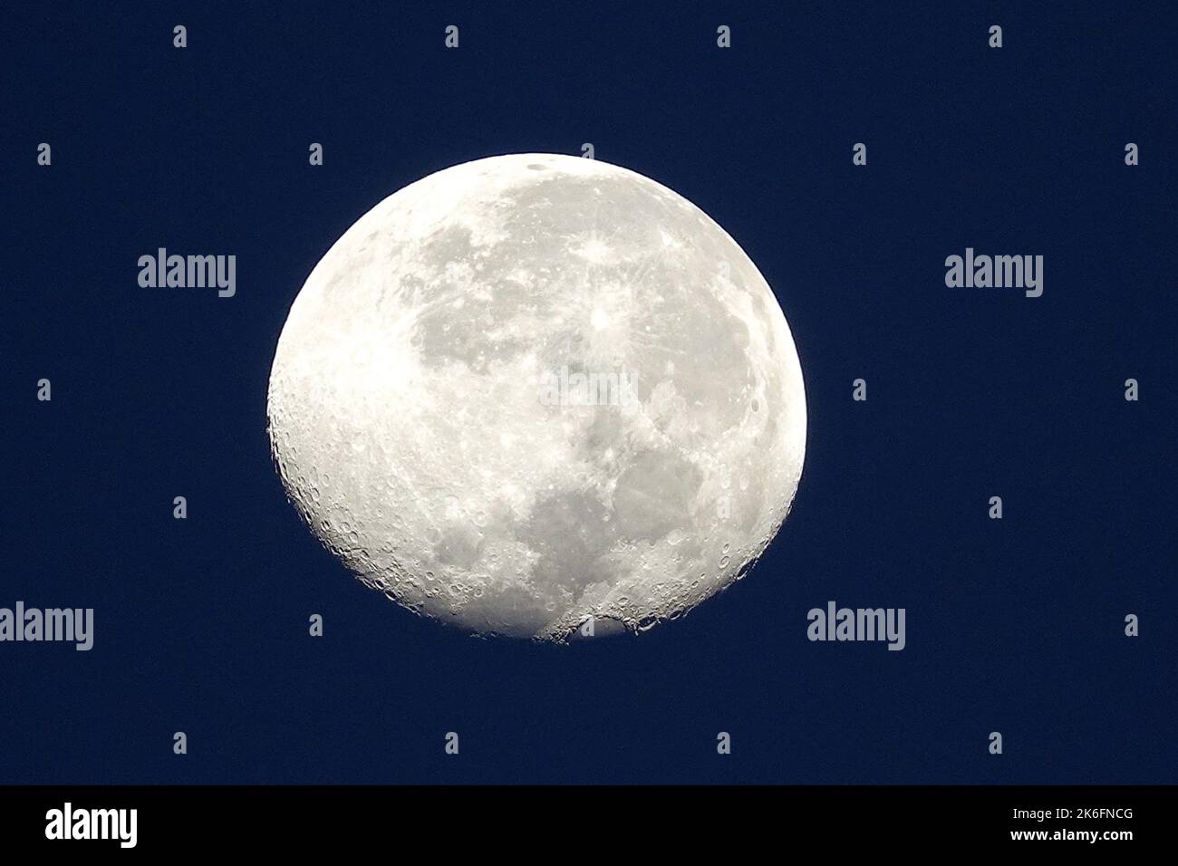 The mesmerizing moon in the night sky Stock Photo - Alamy