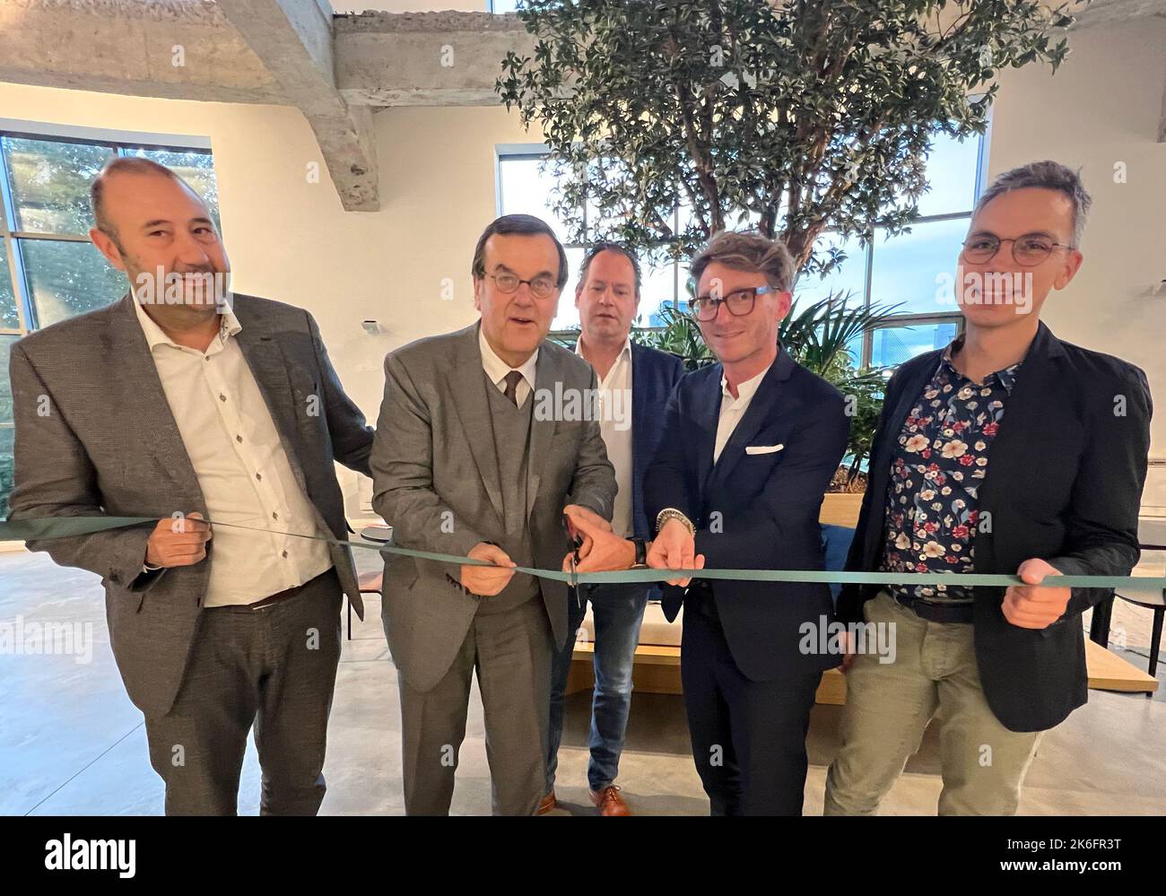 Walloon minister of housing Christophe Collignon, Liege Mayor Willy ...