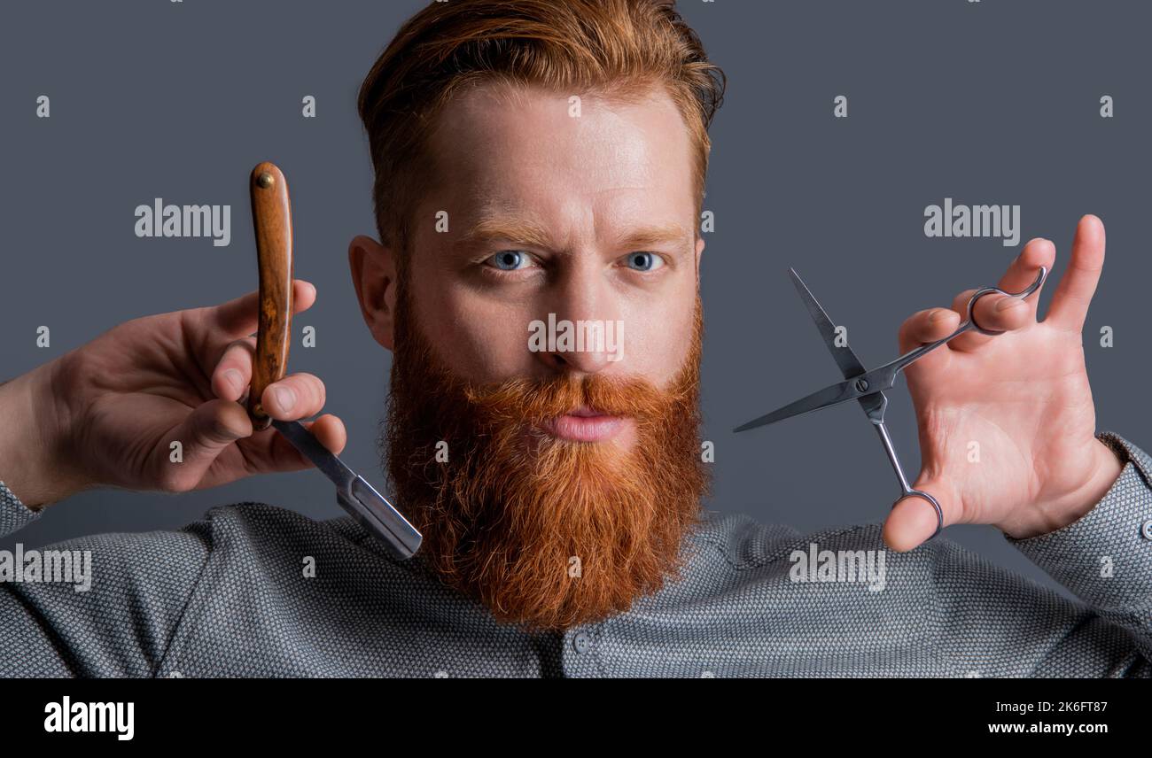 barber man hold scissors and blade at barbershop. concept of barbershop ...