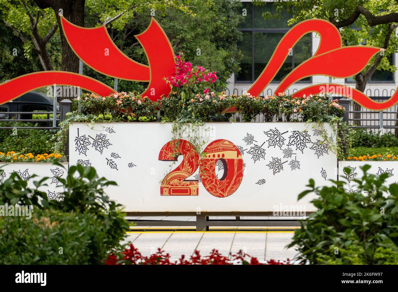 SHANGHAI, CHINA - OCTOBER 14, 2022 - Bright flowers and red streamers ...