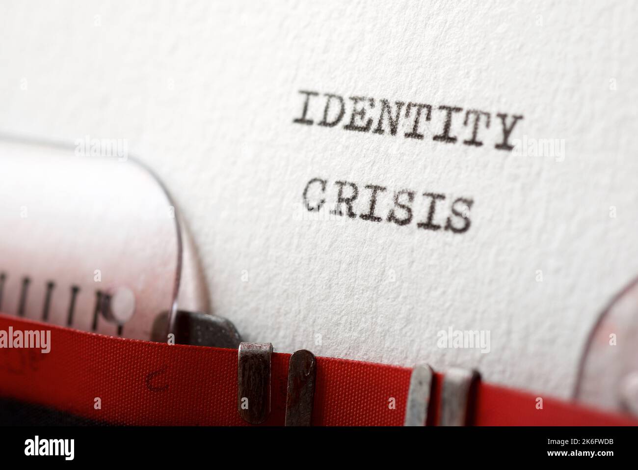 Identity crisis text written with a typewriter Stock Photo - Alamy