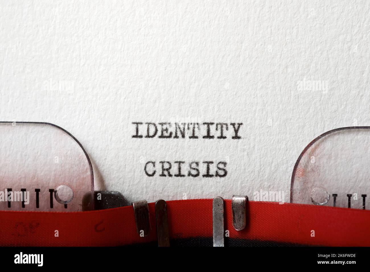 Identity crisis text written with a typewriter Stock Photo - Alamy