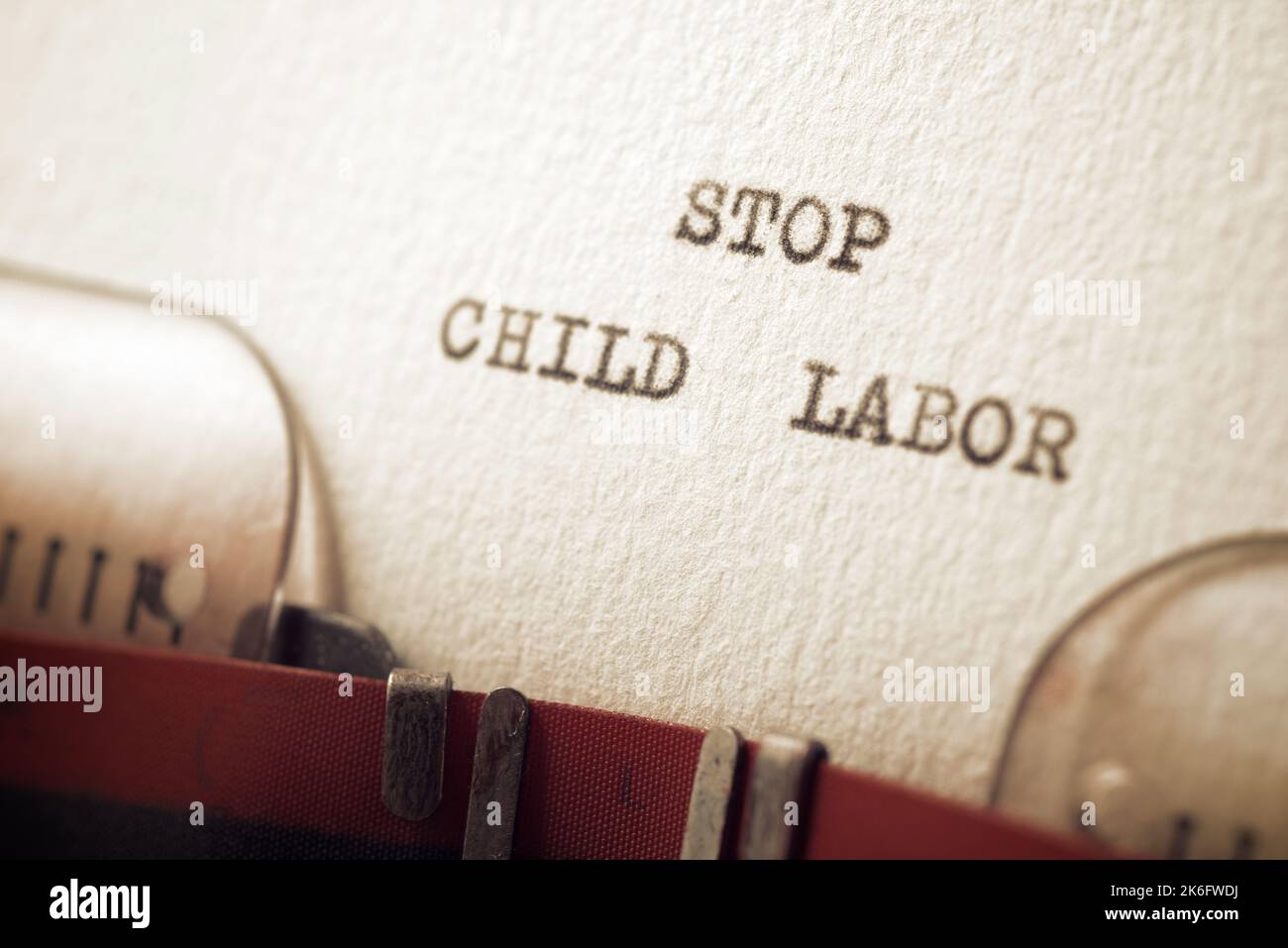 Stop child labor text written with a typewriter Stock Photo - Alamy
