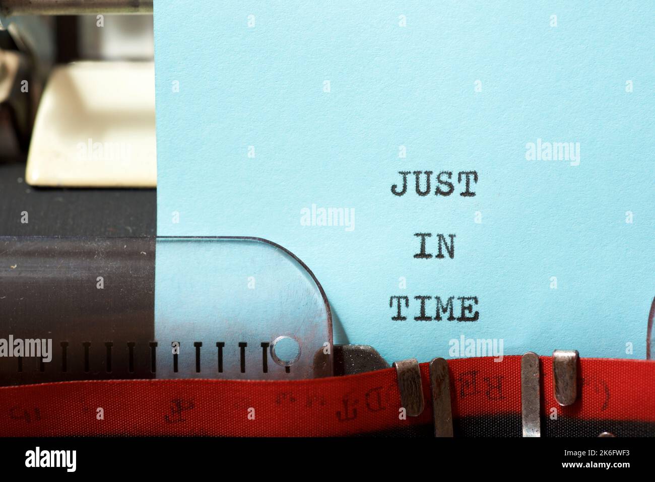 Just in time text written with a typewriter Stock Photo - Alamy