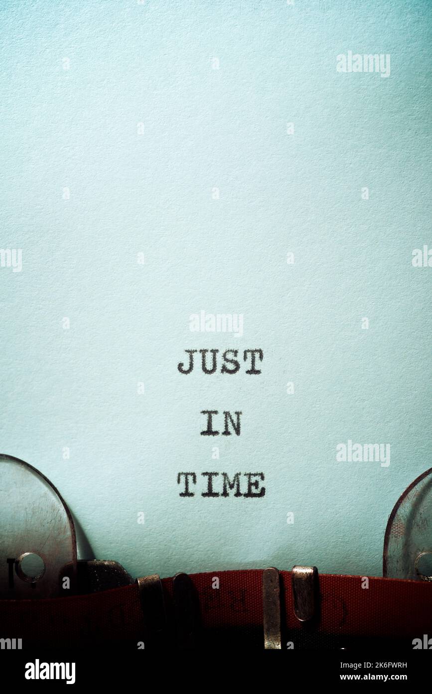 Just in time text written with a typewriter Stock Photo - Alamy