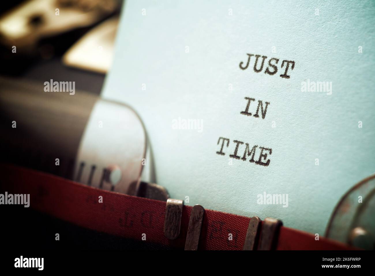 Just in time text written with a typewriter Stock Photo - Alamy