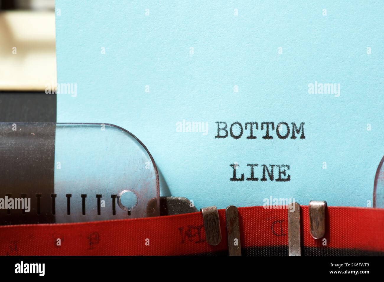 Bottom line text written with a typewriter Stock Photo - Alamy