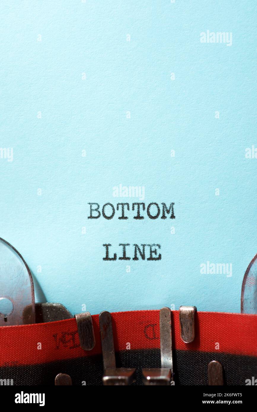 Bottom line text written with a typewriter Stock Photo - Alamy