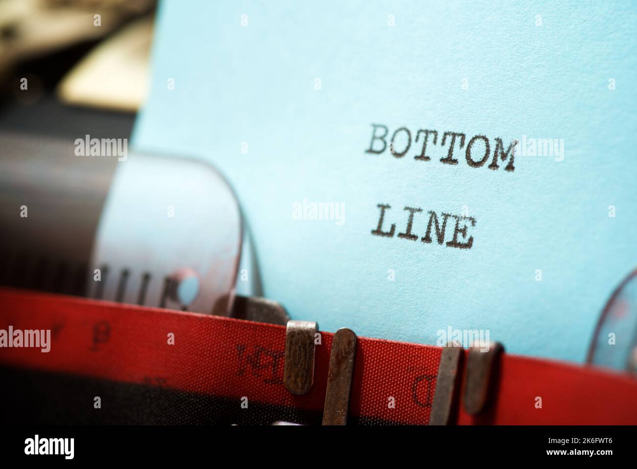 Bottom line text written with a typewriter Stock Photo - Alamy