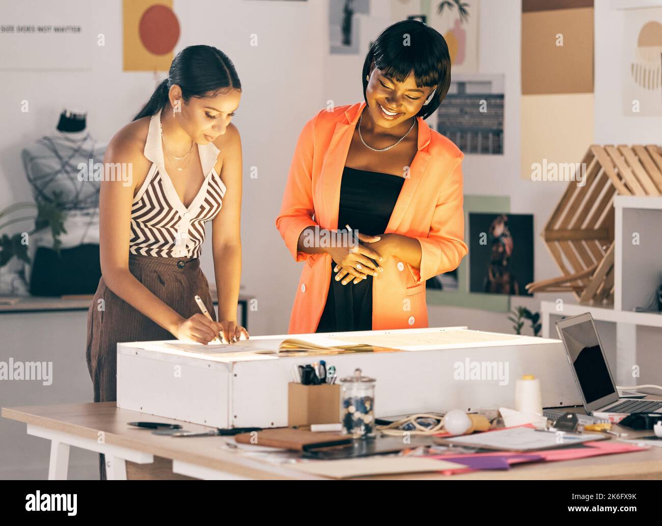 Woman putting together clothes hi-res stock photography and images - Alamy