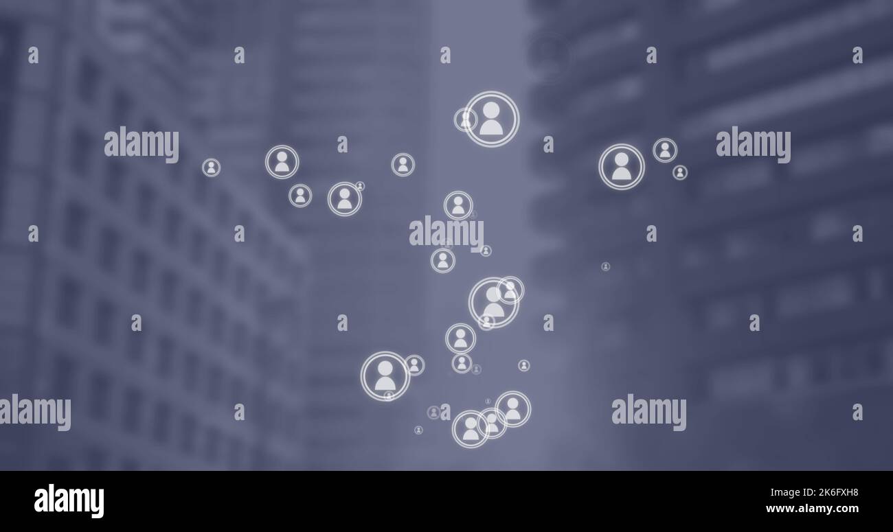 Composite of floating profile icons over modern skyscrapers in city ...