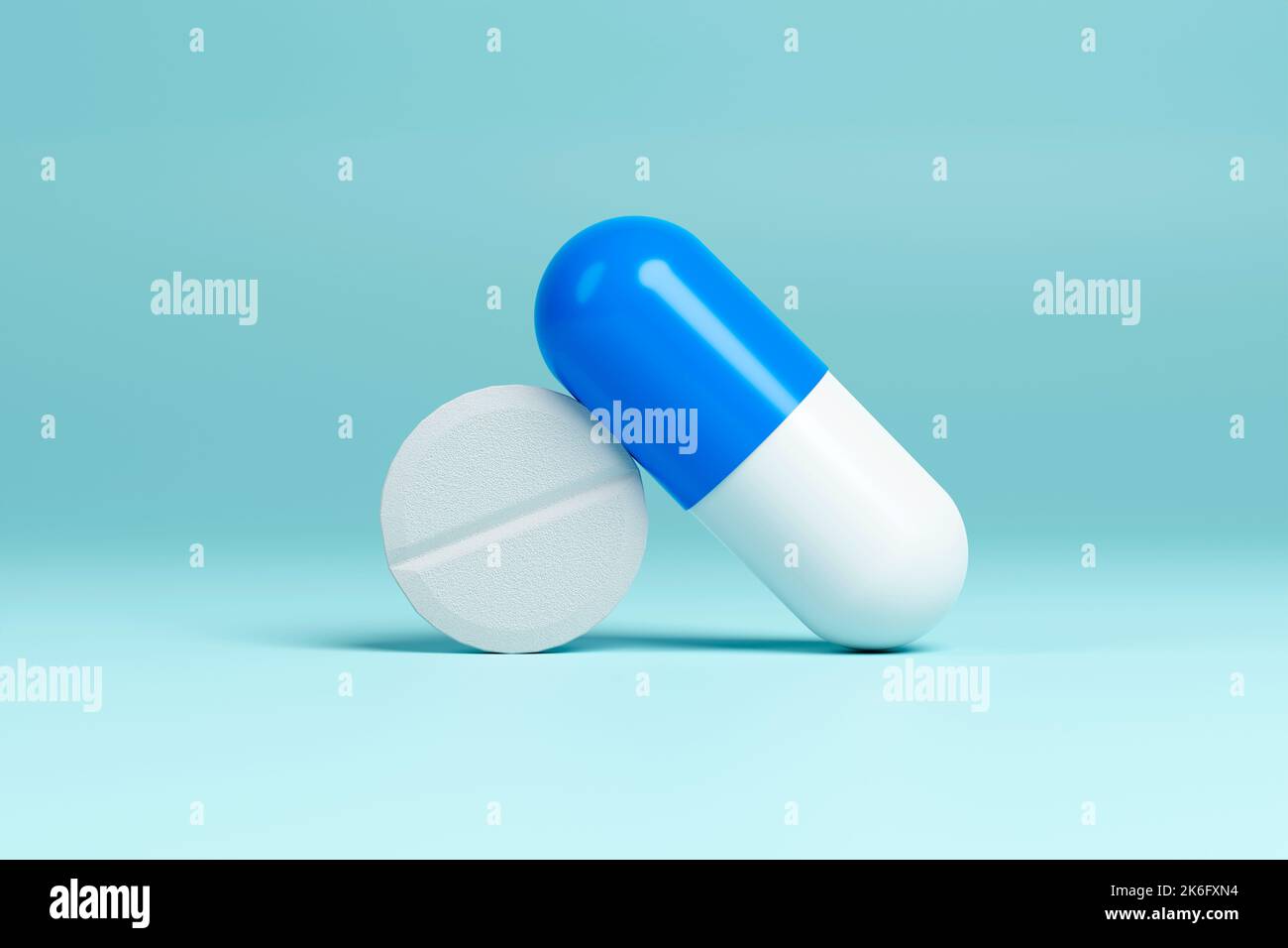 White and blue capsule or painkillers with a pharmacy on a medical ...