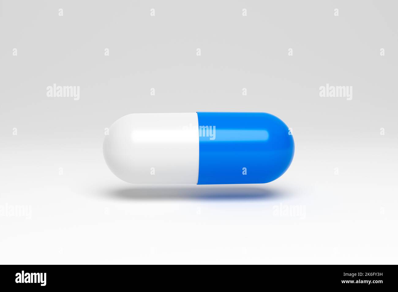 Blue and white capsule on white background. 3d illustration Stock Photo ...
