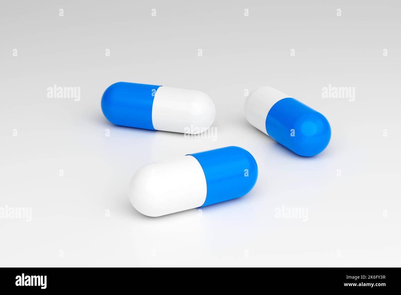 Blue capsule pills on white background. 3d illustration Stock Photo - Alamy