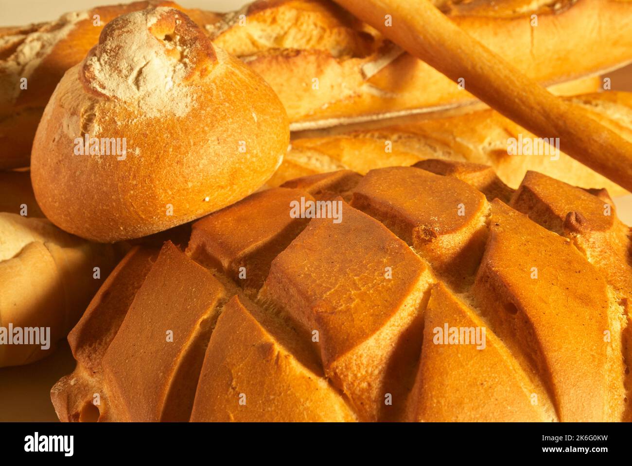 Different types of bread with warm colors Stock Photo - Alamy