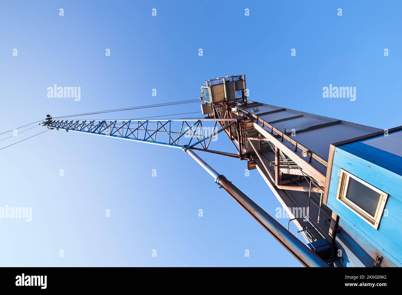 Large cranes in the loading area of a port Stock Photo - Alamy