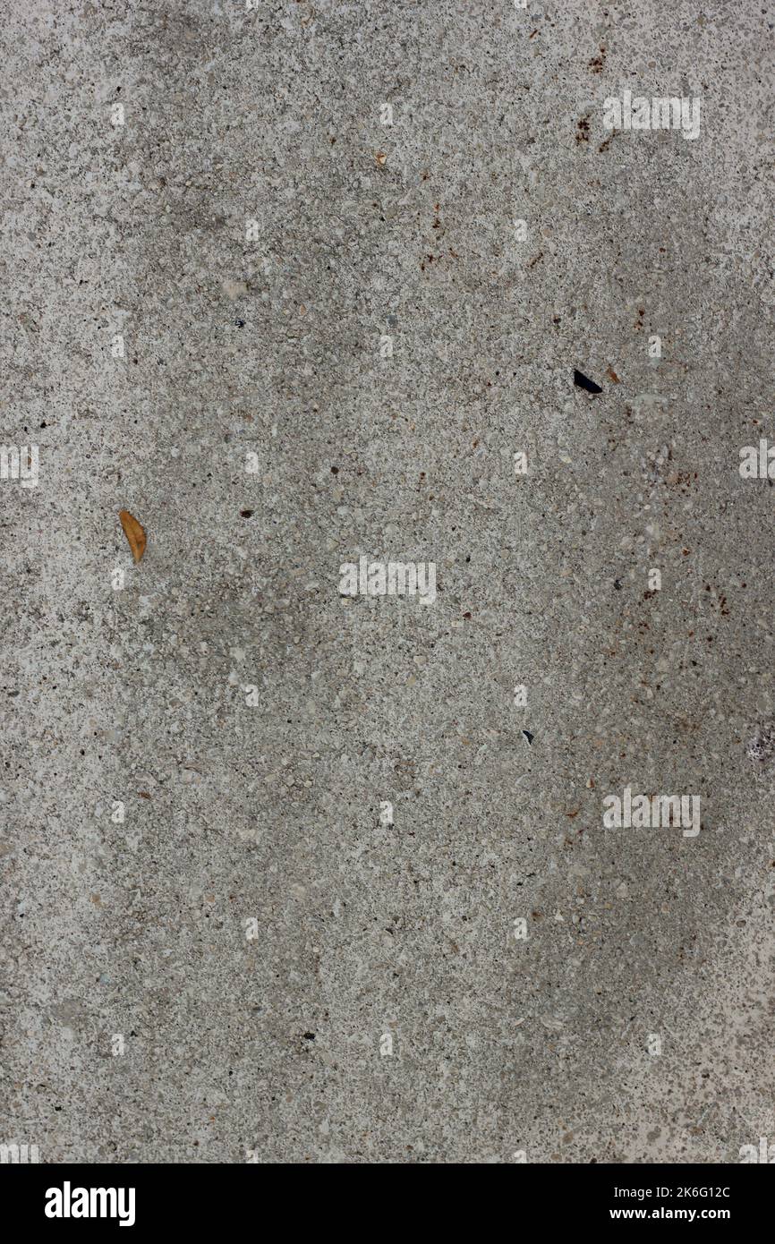 A typical common concrete wall surface with pockmarks and texture Stock ...