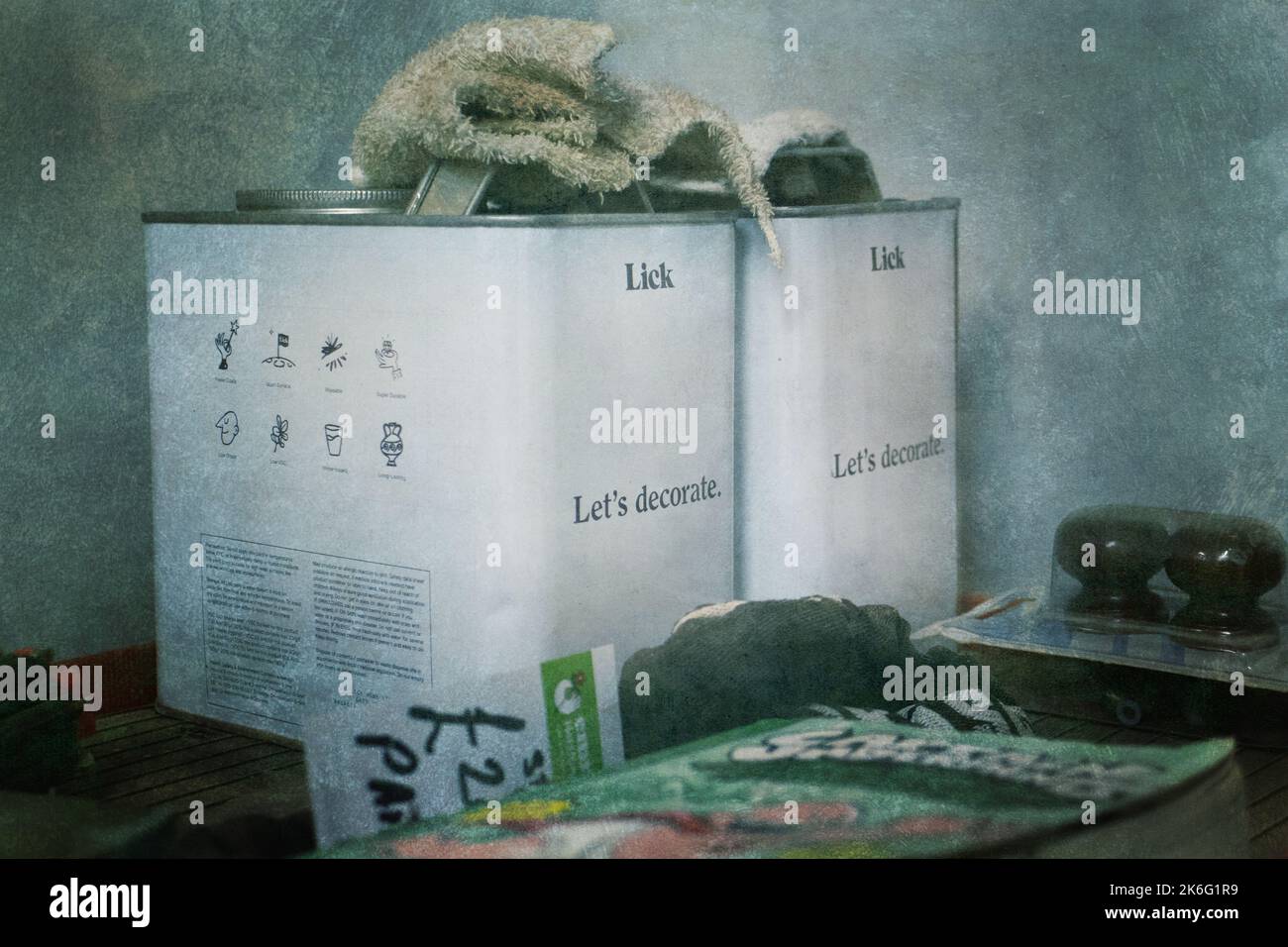 Tins of paint ready for decorating on bench Stock Photo - Alamy