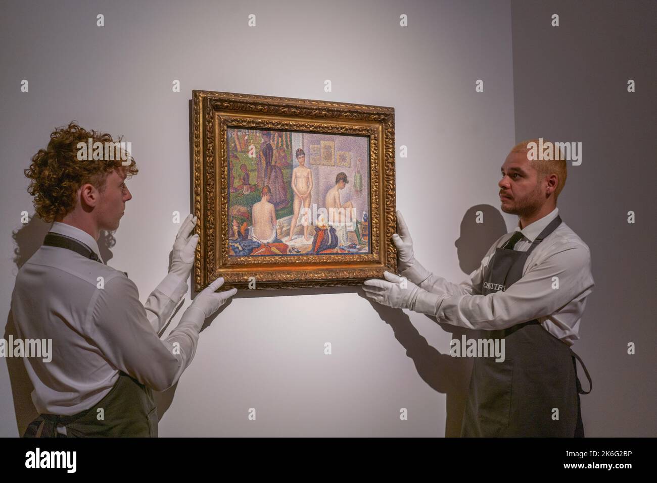 London UK. 14 October 2022 .GEORGES SEURAT (1859-1891) Les Poseuses ...