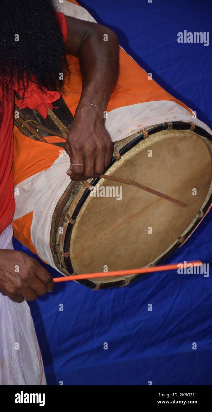Close up shot of the hand of drummer playing Dhak or drum used during ...