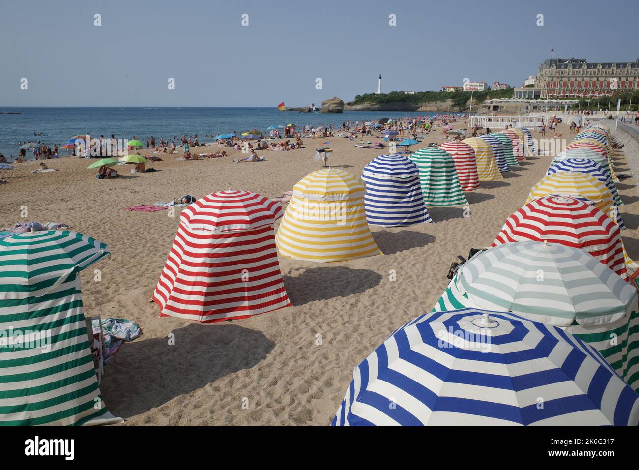 Biarritz, France - 22 July, 2022: Colorful sun shelters on the Grand ...