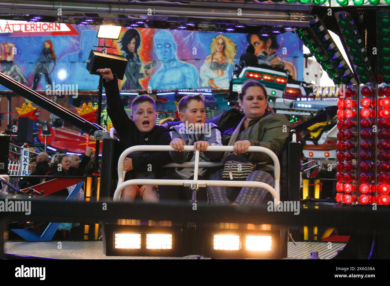 Family Enjoying a fair ride at the Tewkesbury MOP fairs , 7th October ...