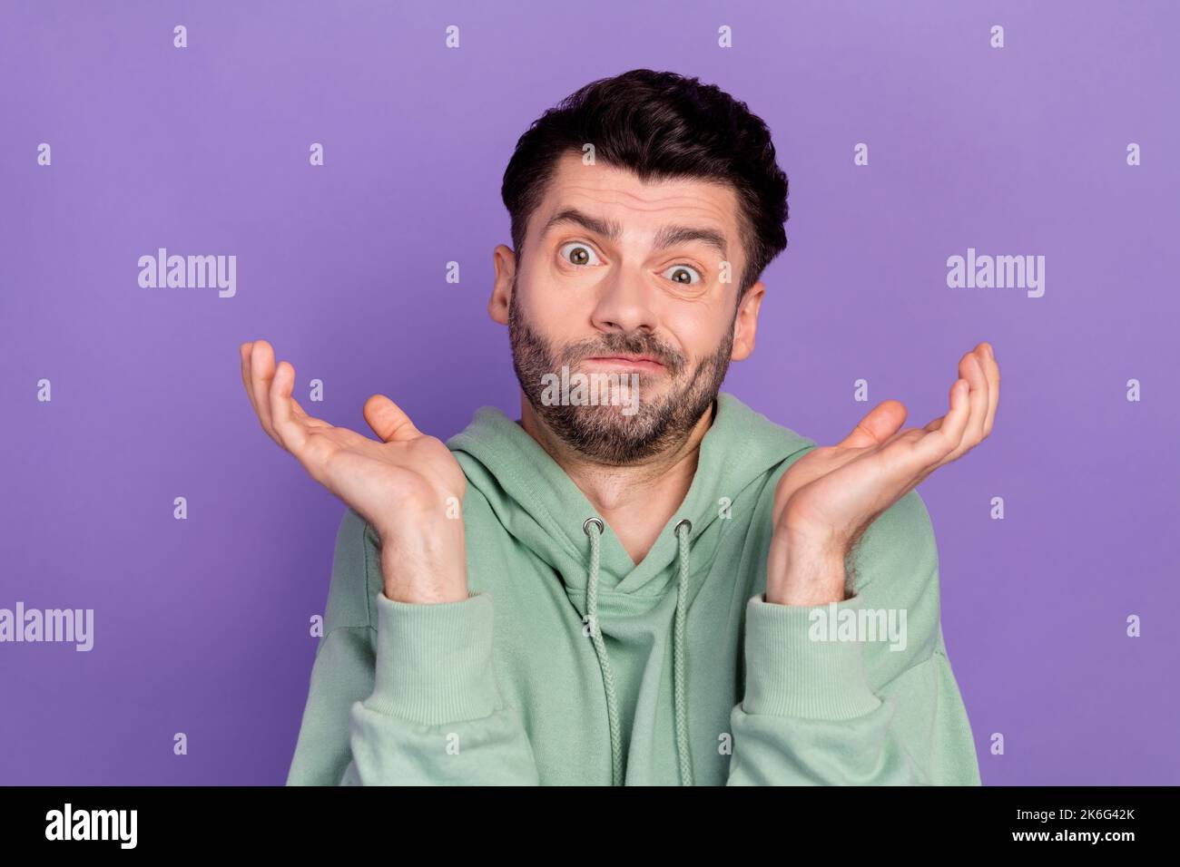 Closeup photo of young irritated indifferent funny guy shrug shoulders ...