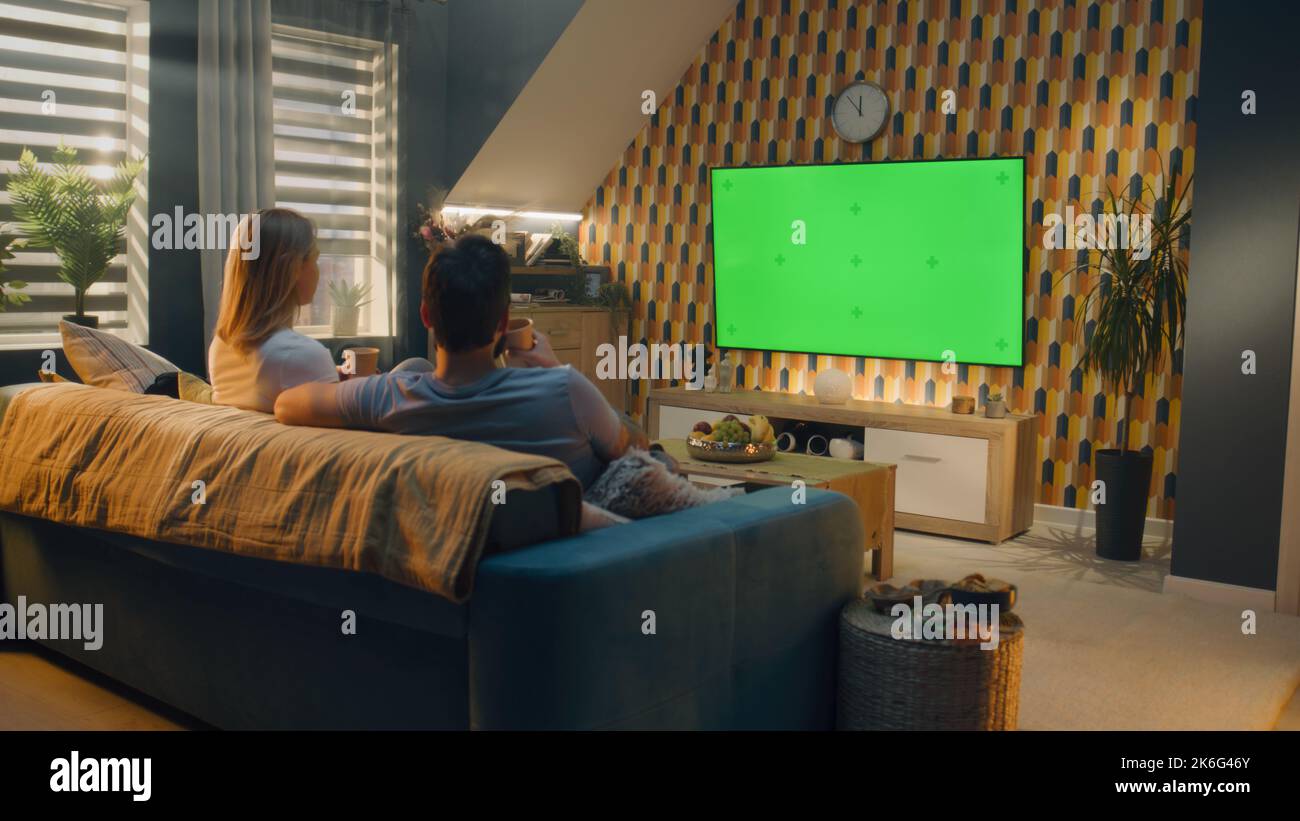 Couple watching tv green screen hi-res stock photography and images - Alamy