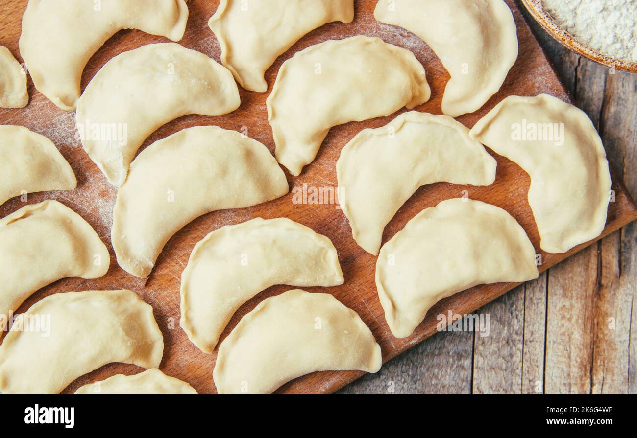 Home cooking dumplings sculpt hands hi-res stock photography and images ...