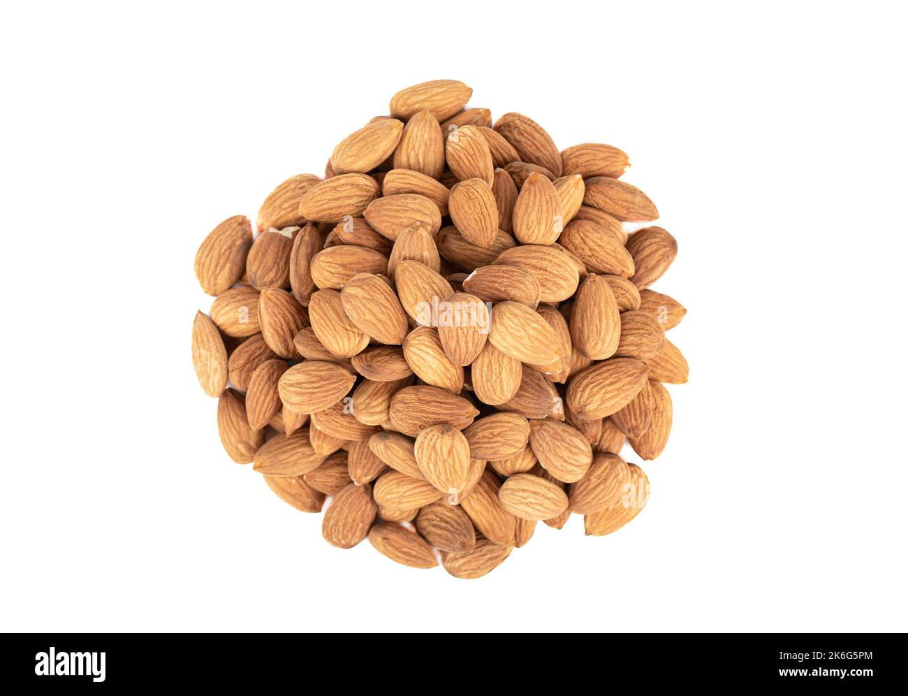 Top view of a bunch of grains of almond nuts on a white background ...