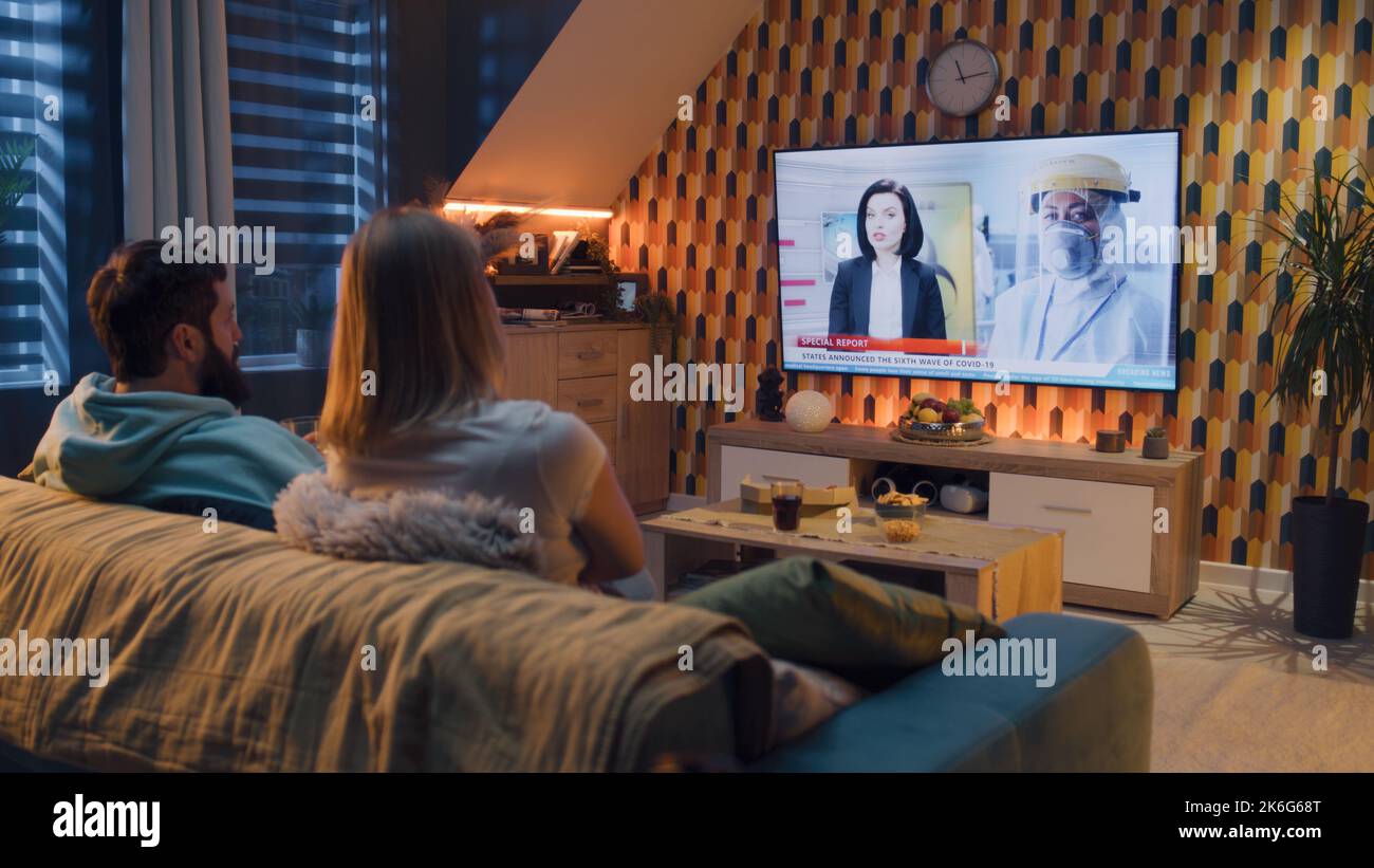 News anchor on tv watch hi-res stock photography and images - Alamy