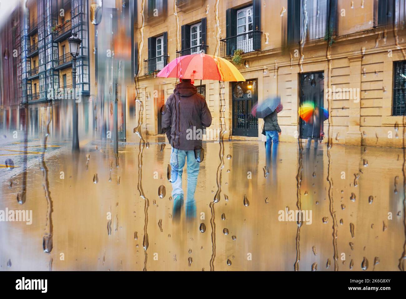 people with an umbrella in rainyn days, bilbao, basque country, spain ...