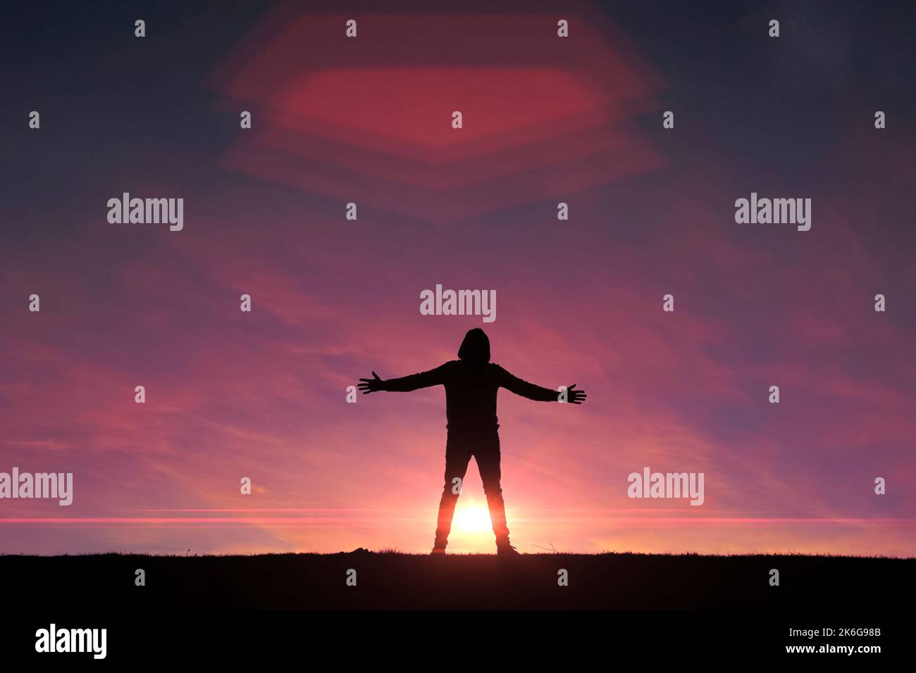 man trekking in the mountain with a sunset background in summertime ...