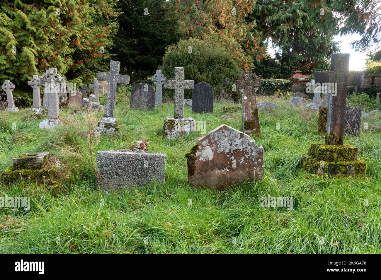 Headstones in the churchyard of St Mary's Church in Bramshott ...