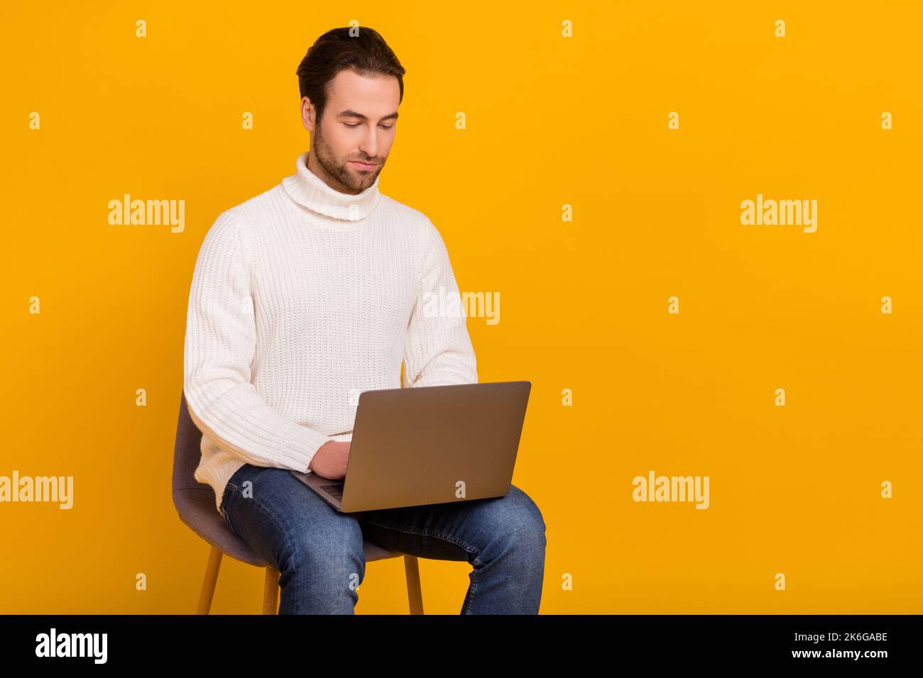 Photo of confident programmer guy sit chair typing pc coding wear white ...