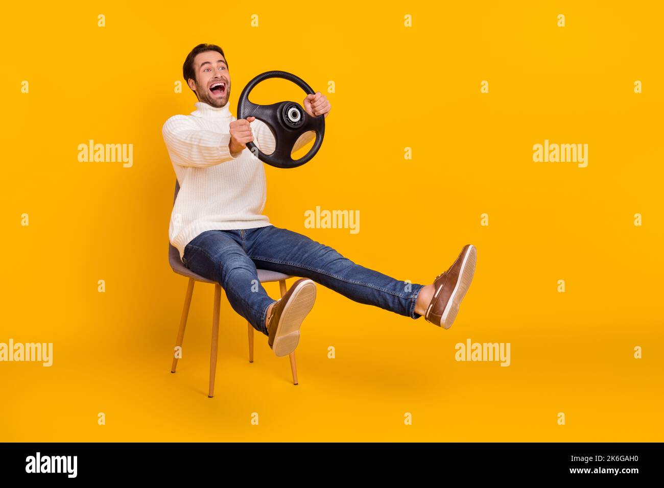 Photo of funny guy hold steering wheel sit chair car incident concept ...