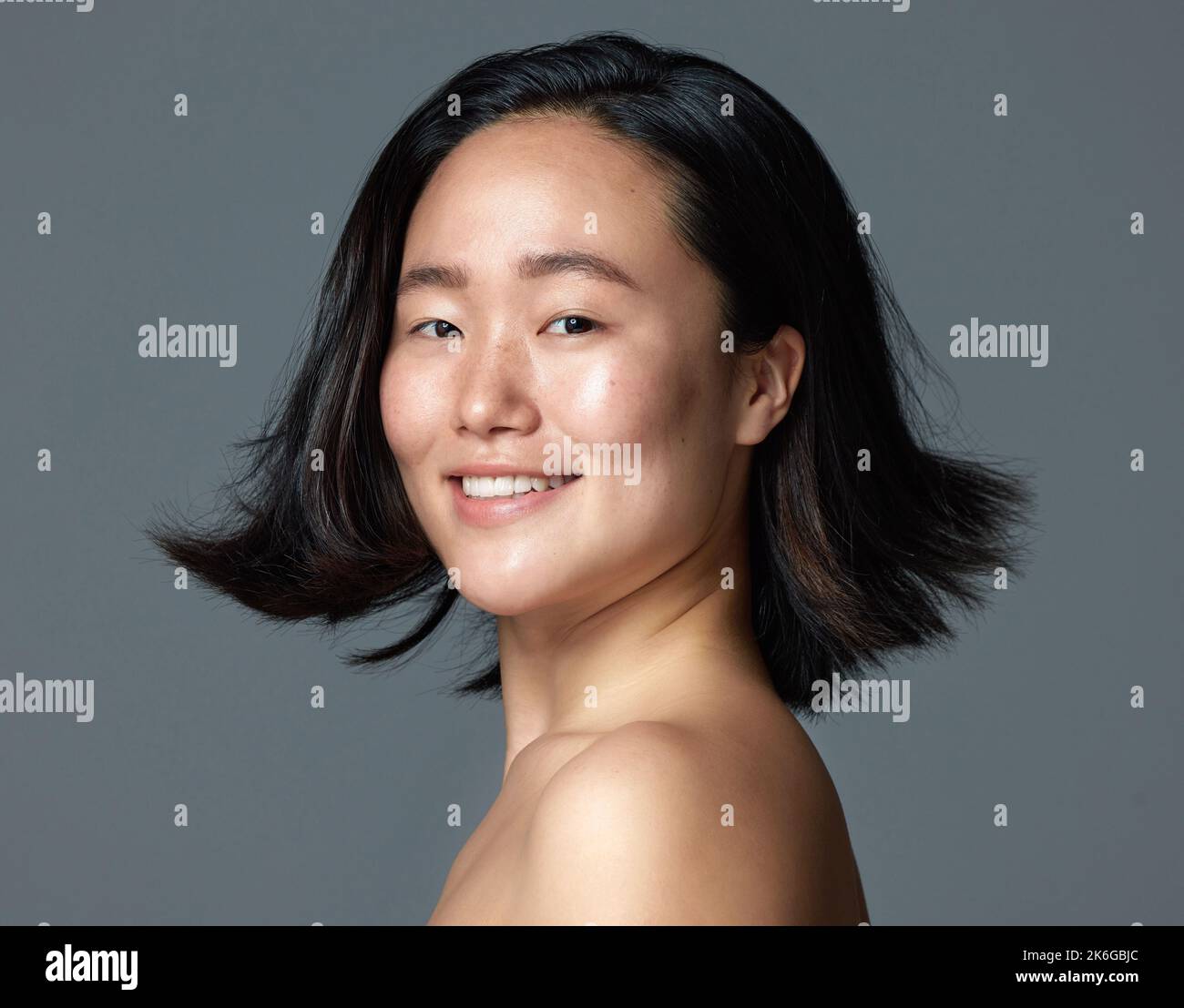 I feel refreshed. Studio shot of a beautiful young woman posing against ...