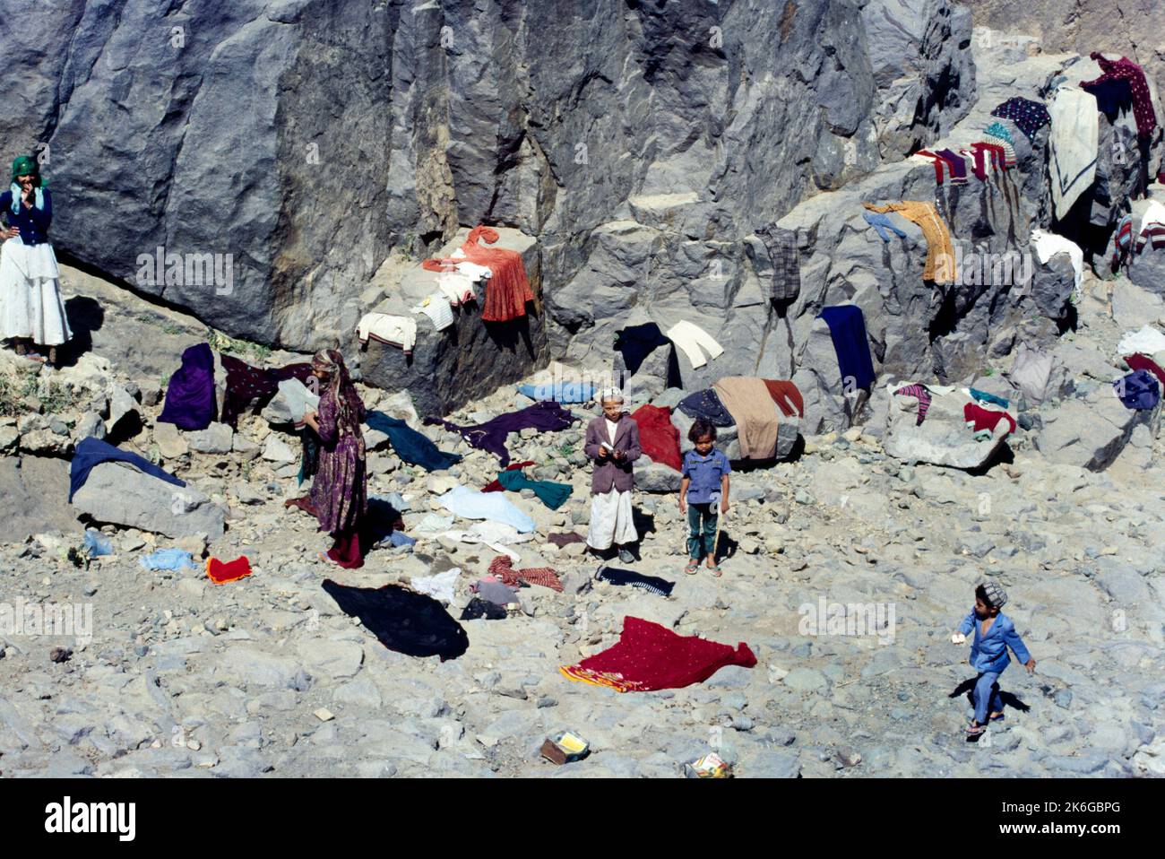 Women washing clothes on rocks hi-res stock photography and images - Alamy