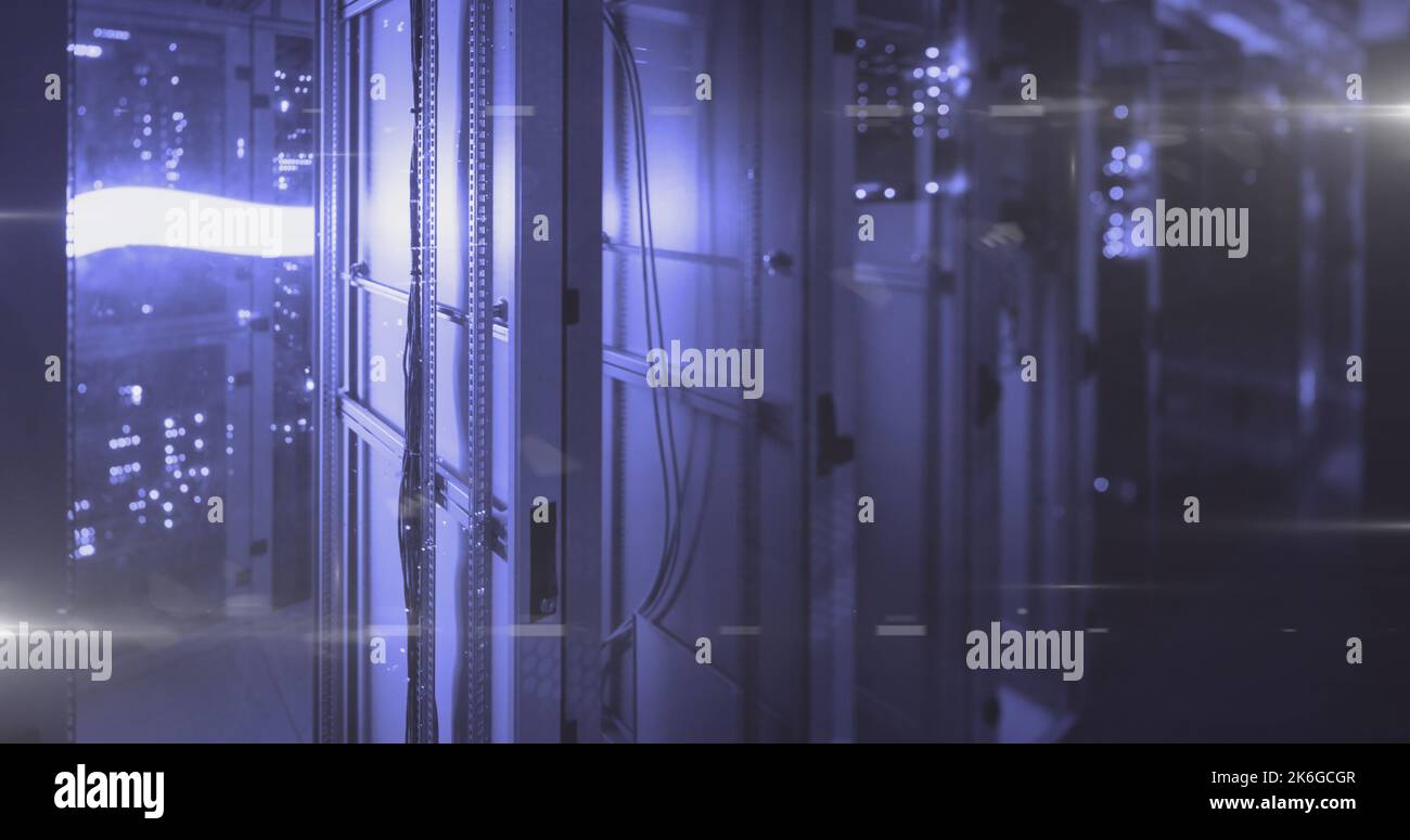 Image Of Mathematical Equations And Data Processing Over Rainbow Lens Flare Against Server Room