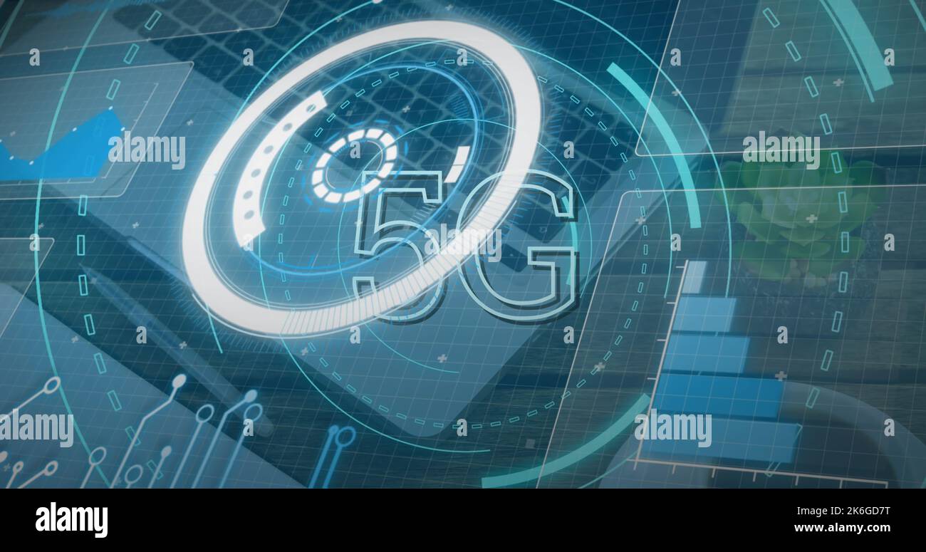 Image of scope scanning with 5g text and data processing over desk with laptop Stock Photo - Alamy