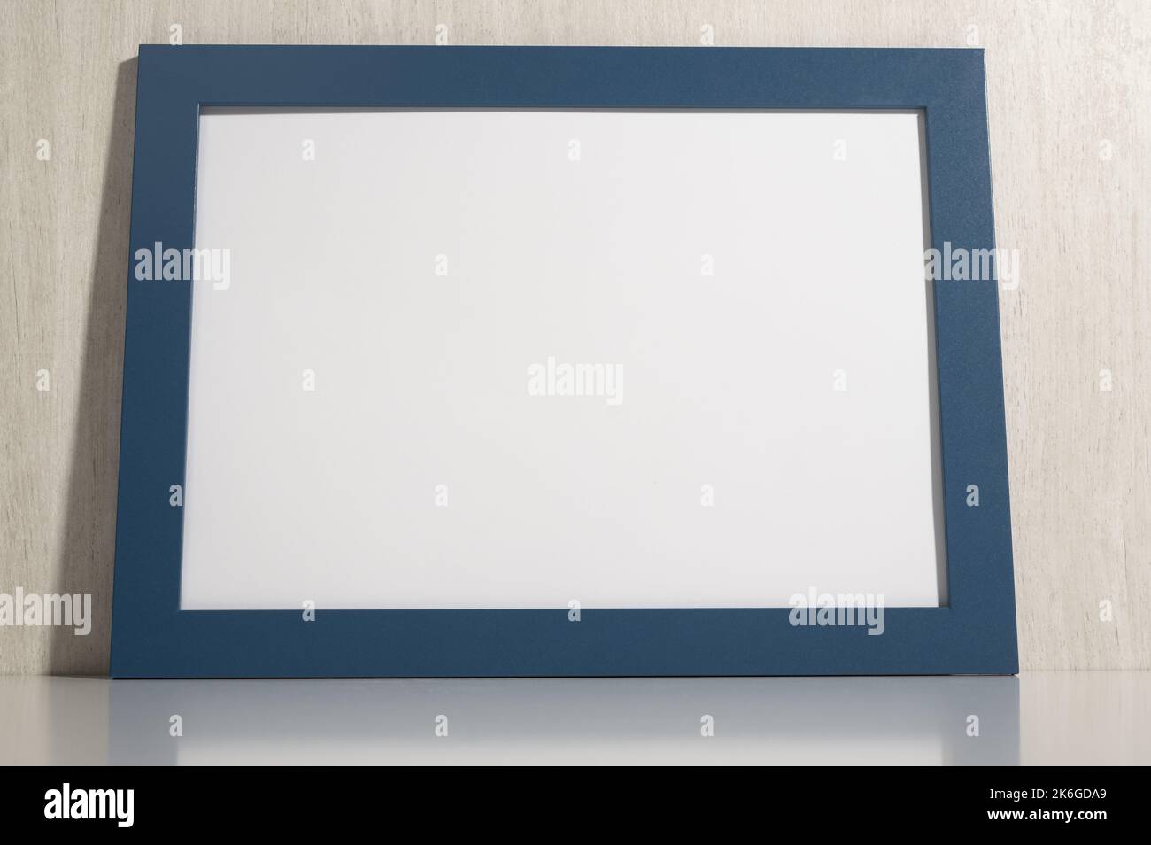 Horizontal photo frame mockup on white wall. blank diploma frame on ...